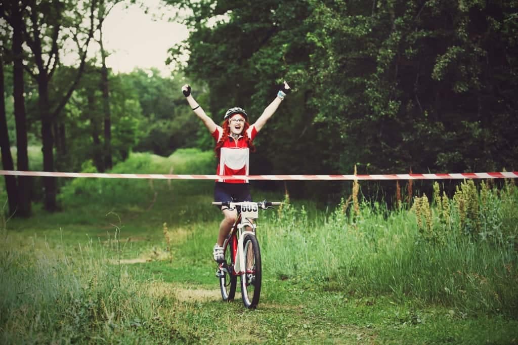 young-woman-wins-the-race-crossing-finish-line-picture-id527893024 ...
